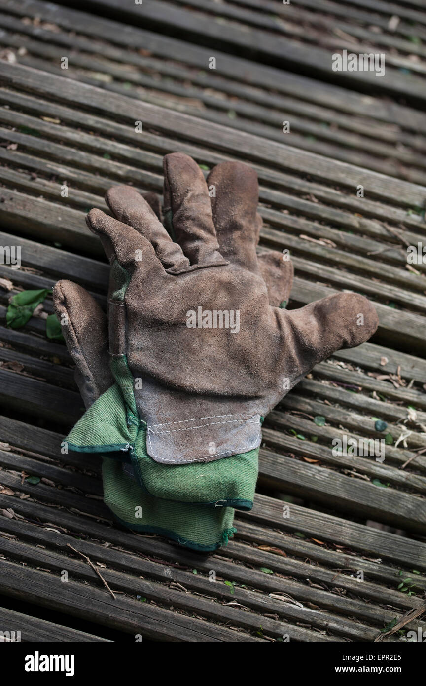 Dirty gardening gloves hi-res stock photography and images - Alamy