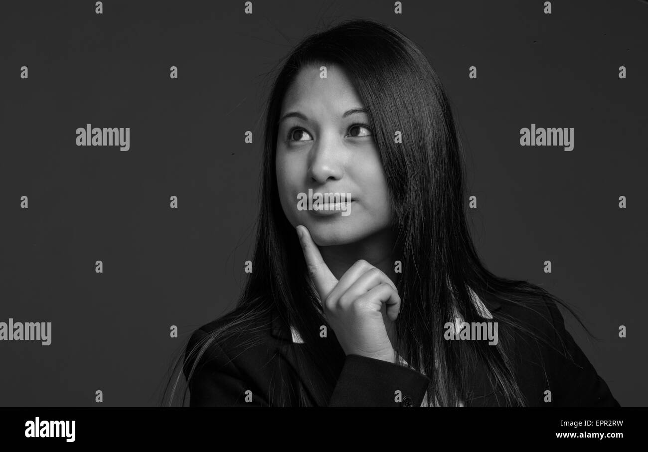 Young asian business woman thinking Black and White Stock Photos ...