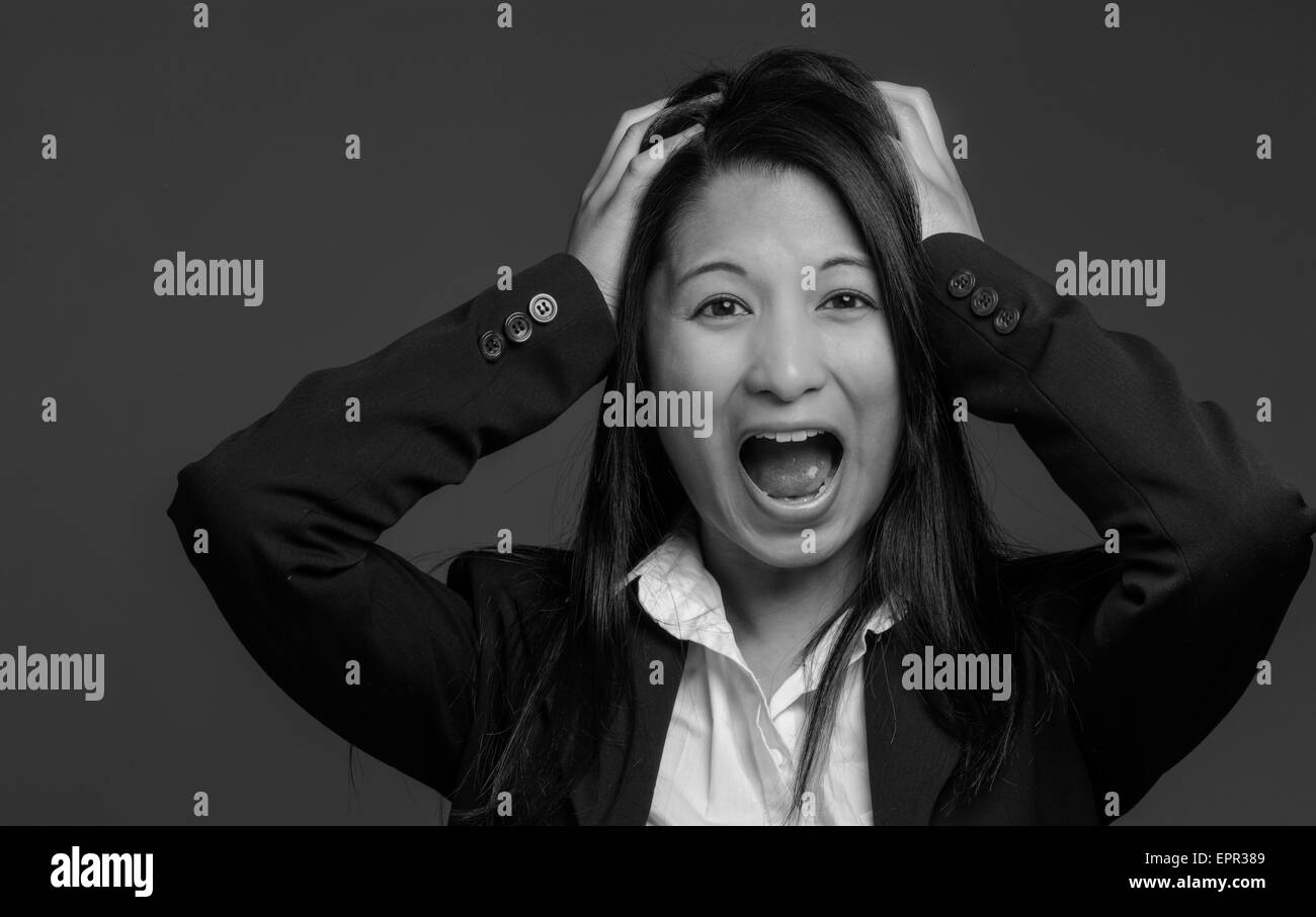 Woman pulling out her hair Black and White Stock Photos & Images - Alamy