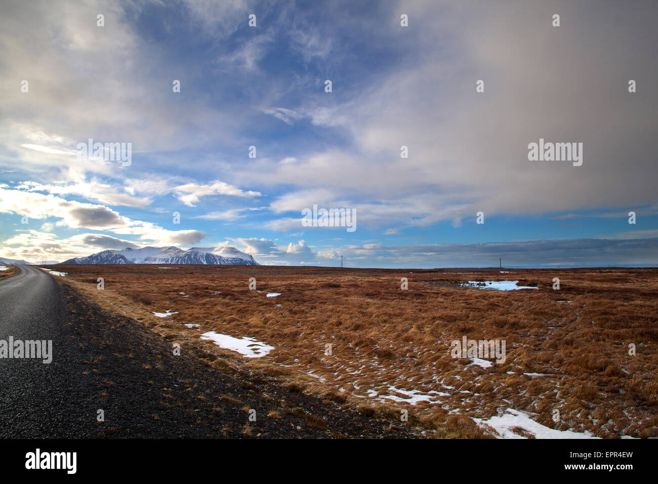 Snowy volcano landscape with dramatic clouds in West Iceland Stock ...