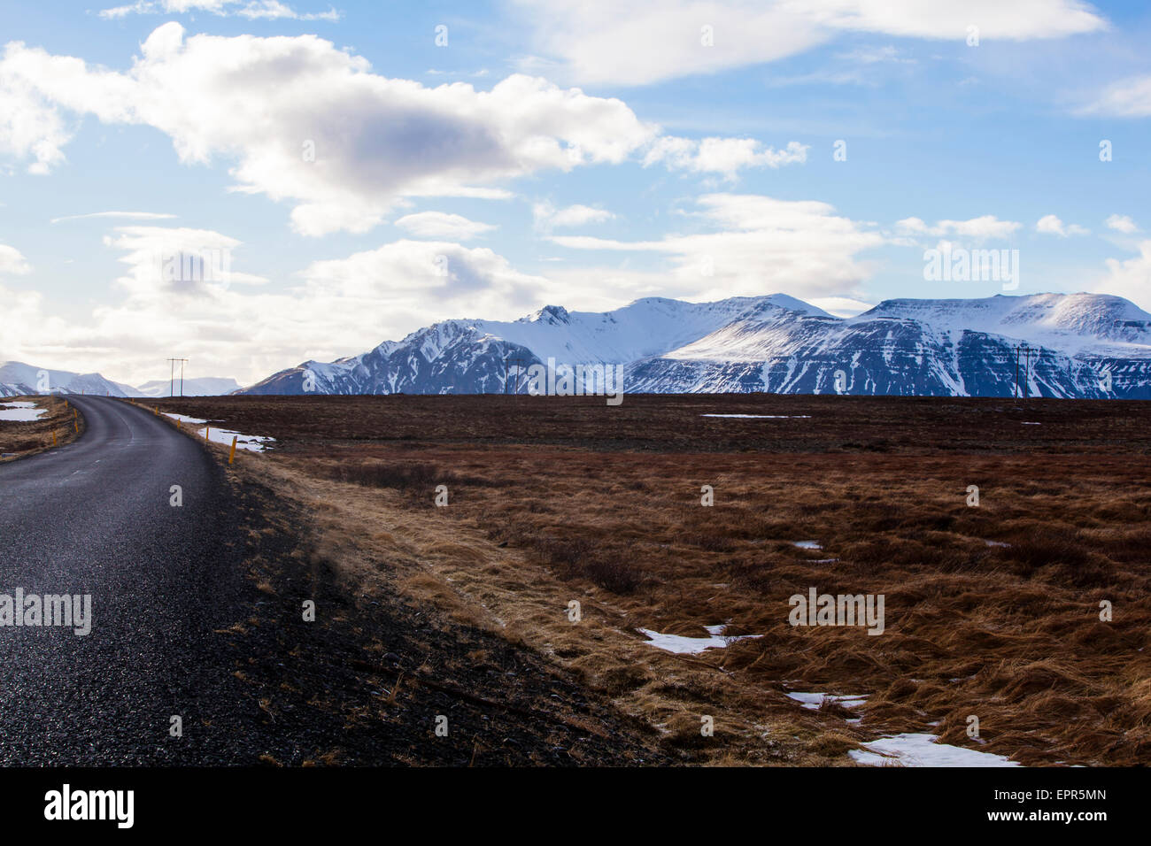 Snowy volcano landscape with dramatic clouds in West Iceland Stock ...