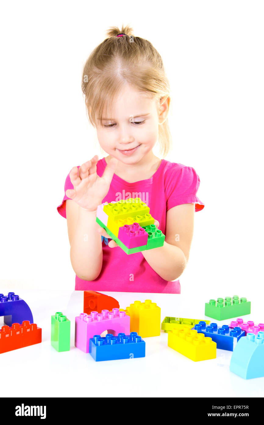 Little Girl Plays Block Isolated on White Background Stock Photo - Alamy