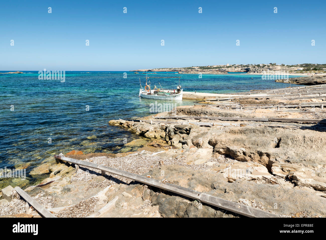 Fishing rowboat (gozzo) resting on the beach of Es Pujol, Formentera ...