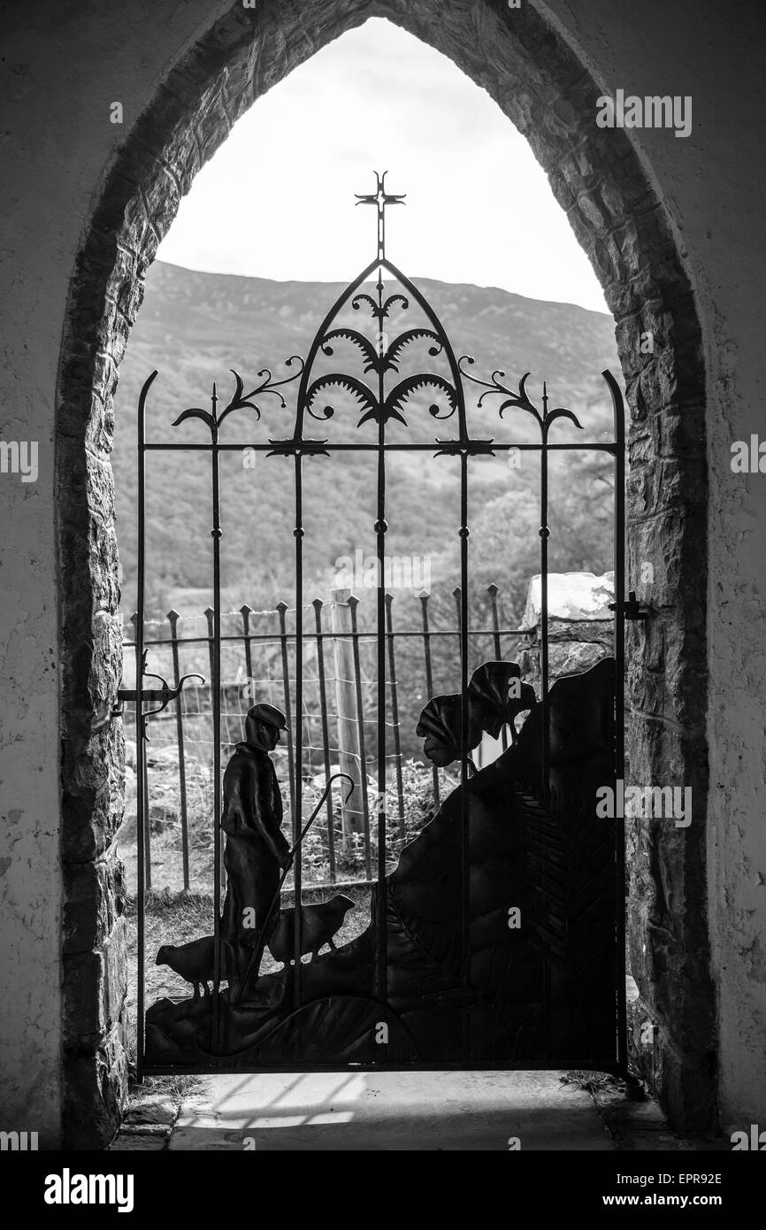 The Shepherd and Sheep iron gate to the entrance of St James' Church ...