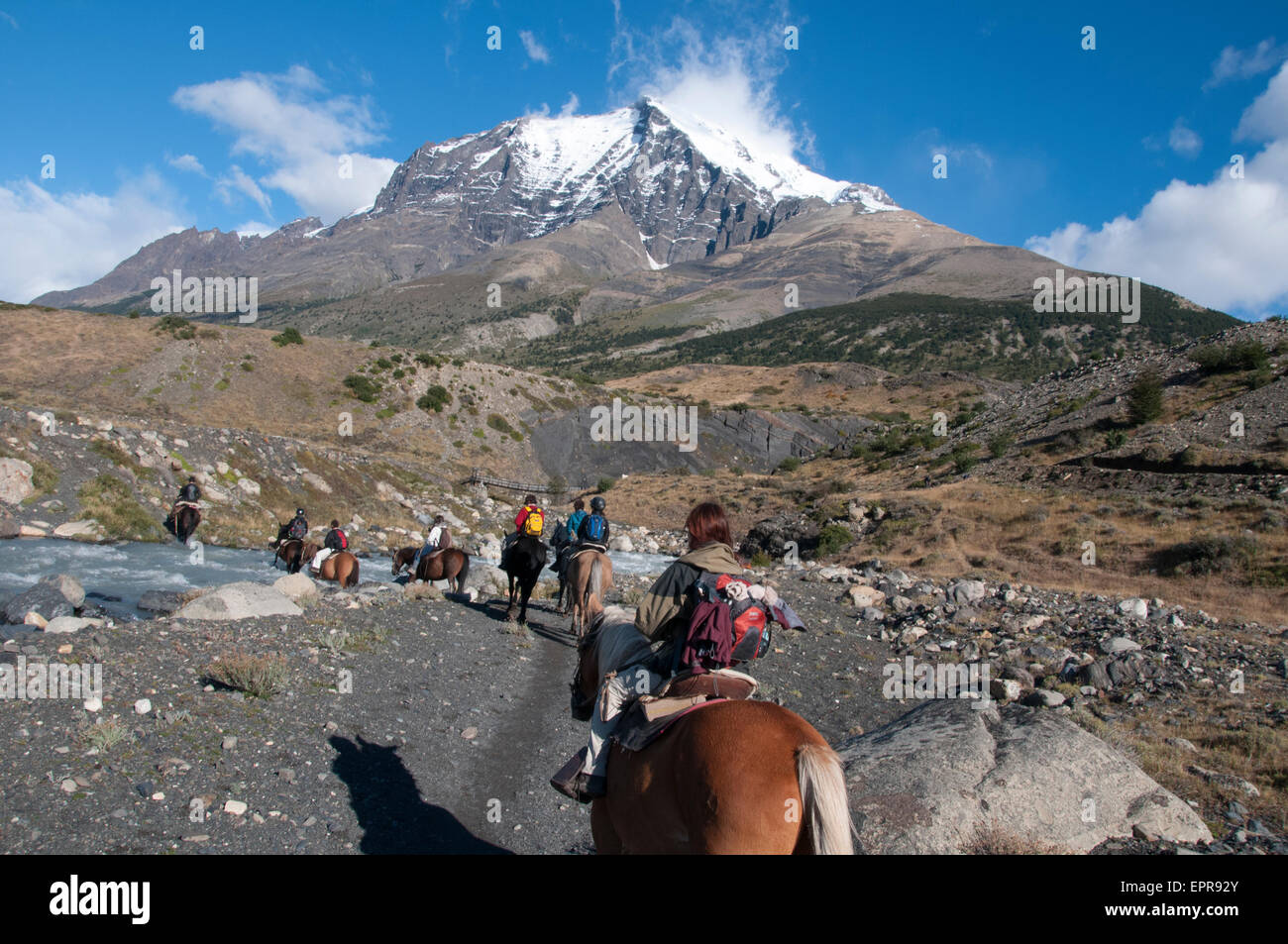 Pony trekking party setting out to ride into Torres del Paine National ...