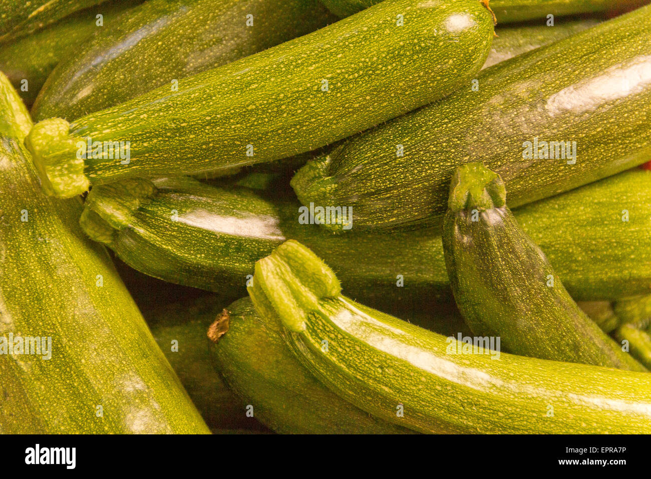 Organic farmers market green zucchini closeup for use as healthy eating ...