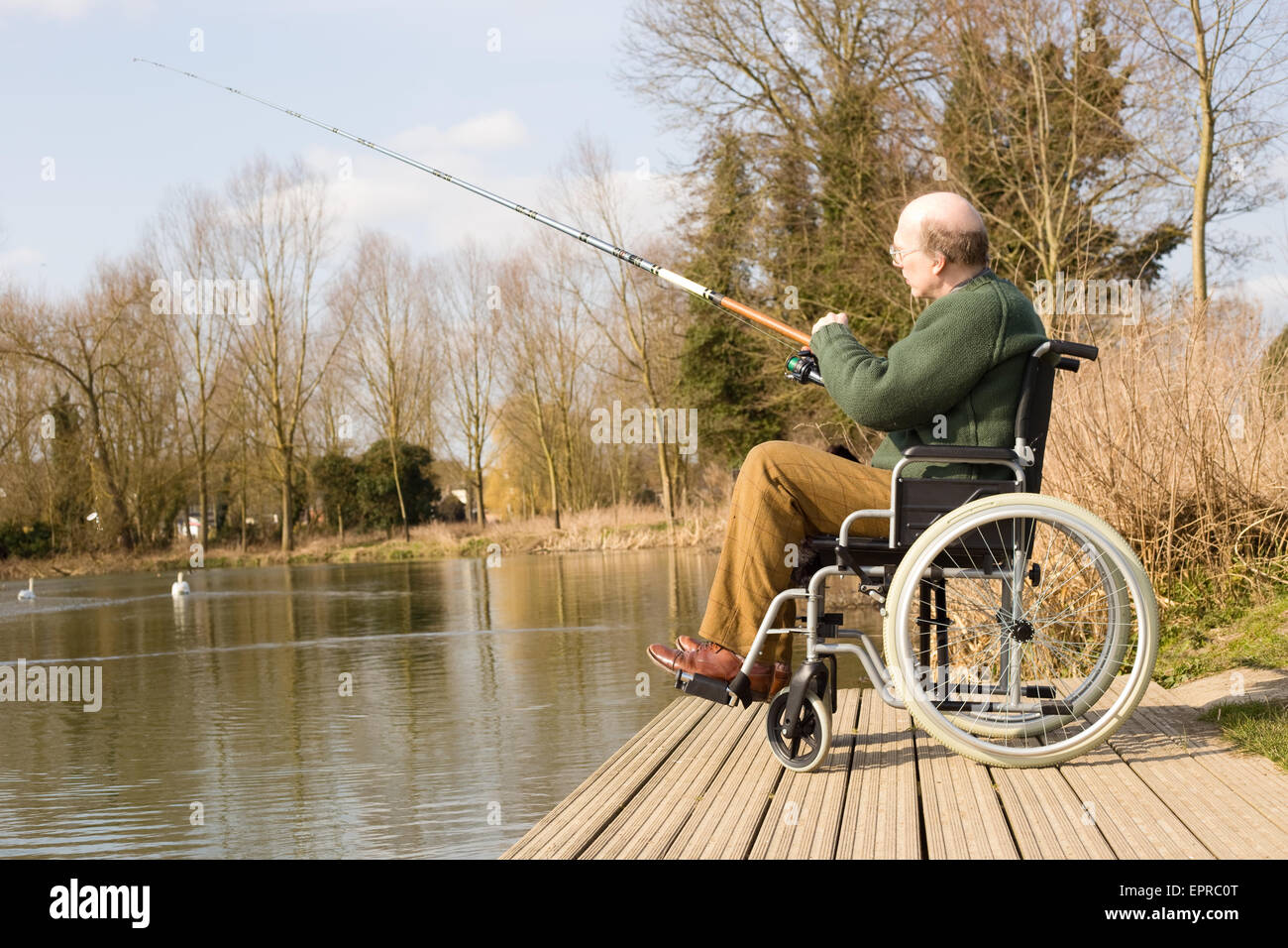 Person disability fishing hi-res stock photography and images - Alamy