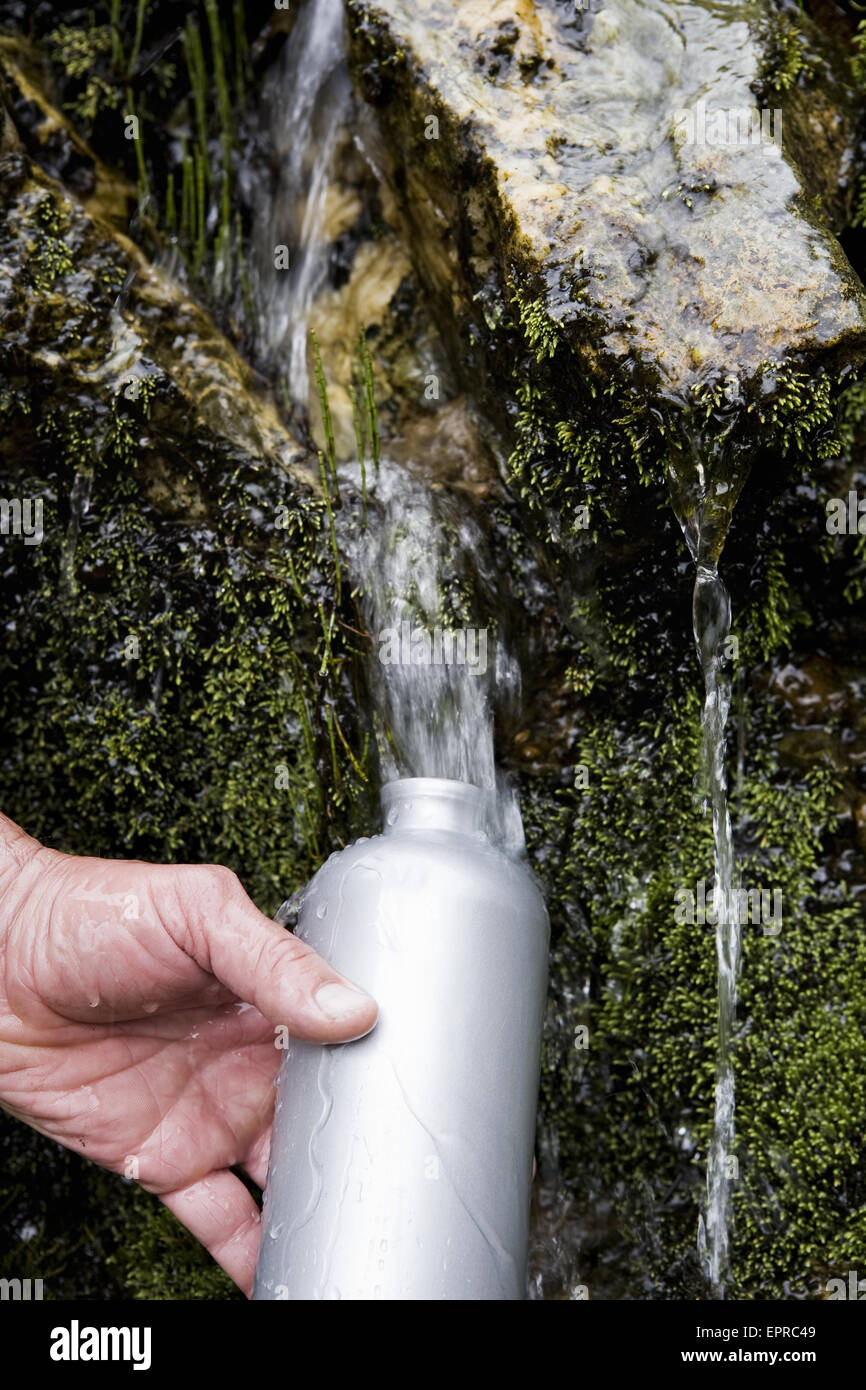 Spring water flows along the trail Stock Photo - Alamy