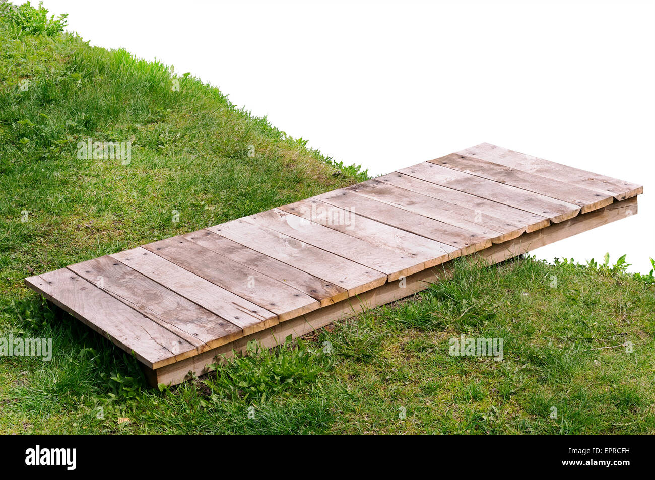 The small wooden rural bridge over an abyss concept. Isolated spring ...