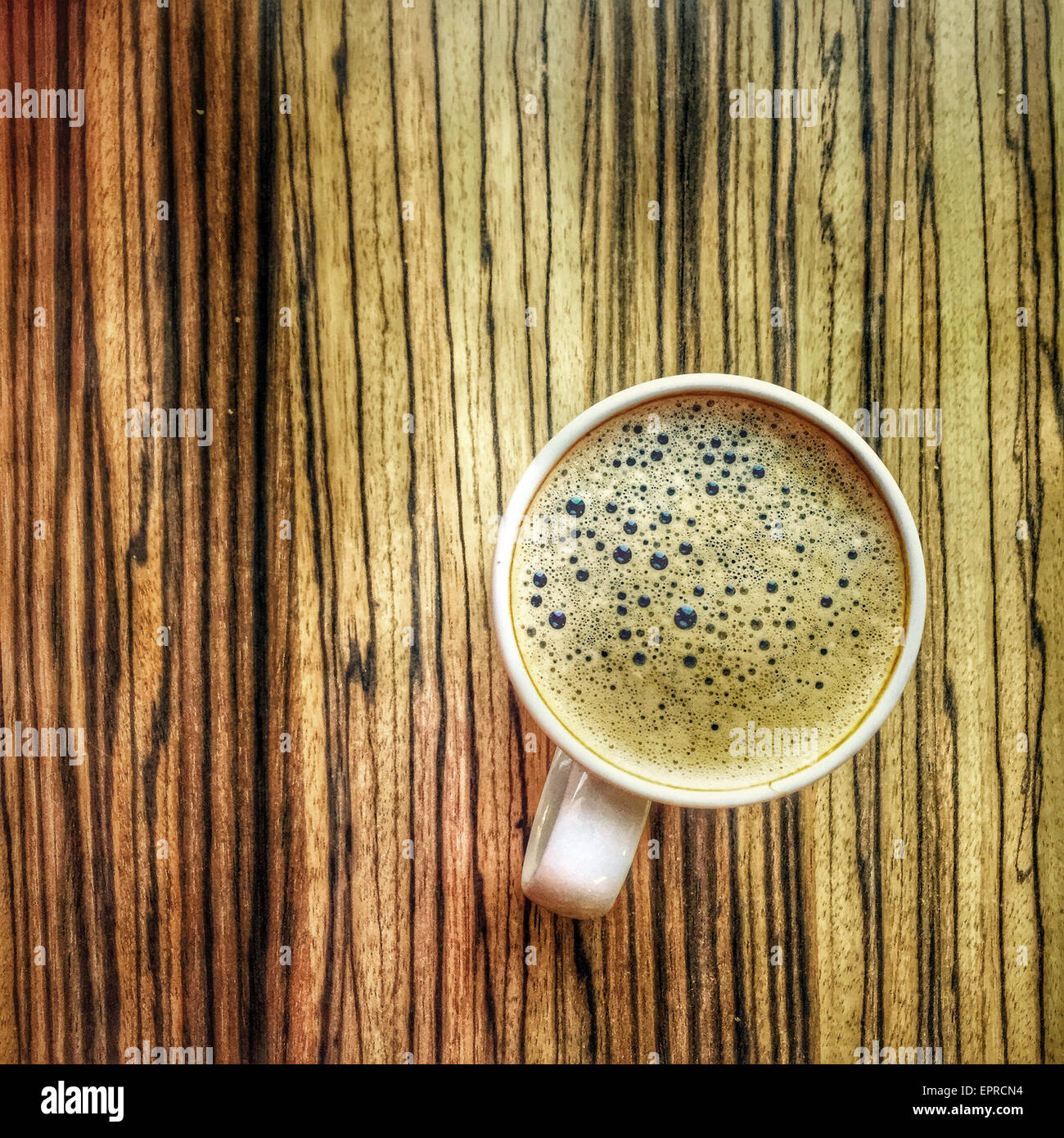 Coffee on wooden table top view Stock Photo - Alamy
