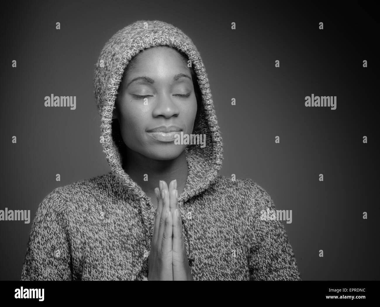 Model isolated praying Stock Photo - Alamy