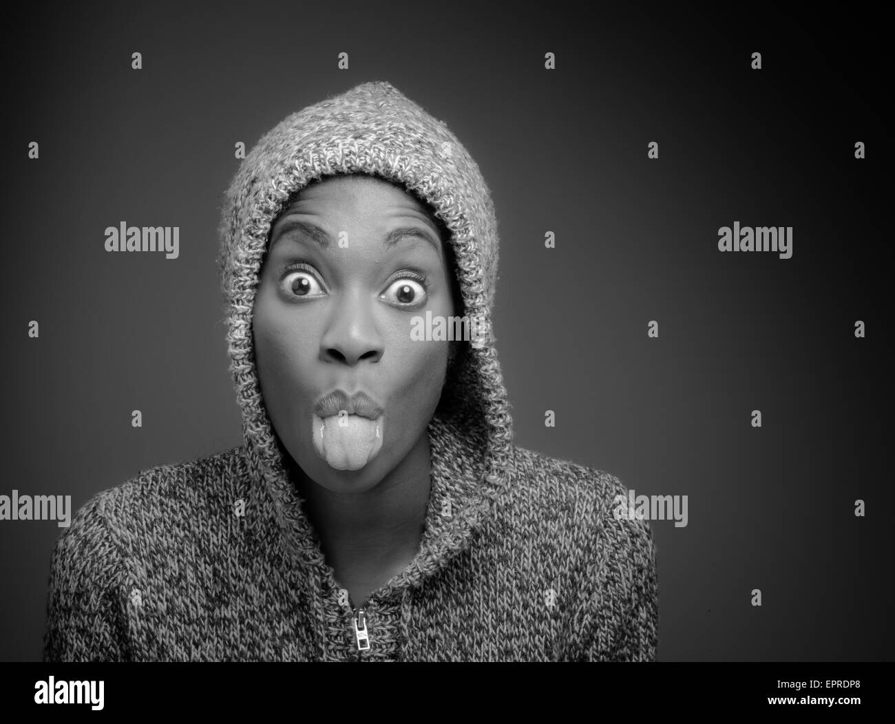 Model isolated sticking tongue out Stock Photo - Alamy