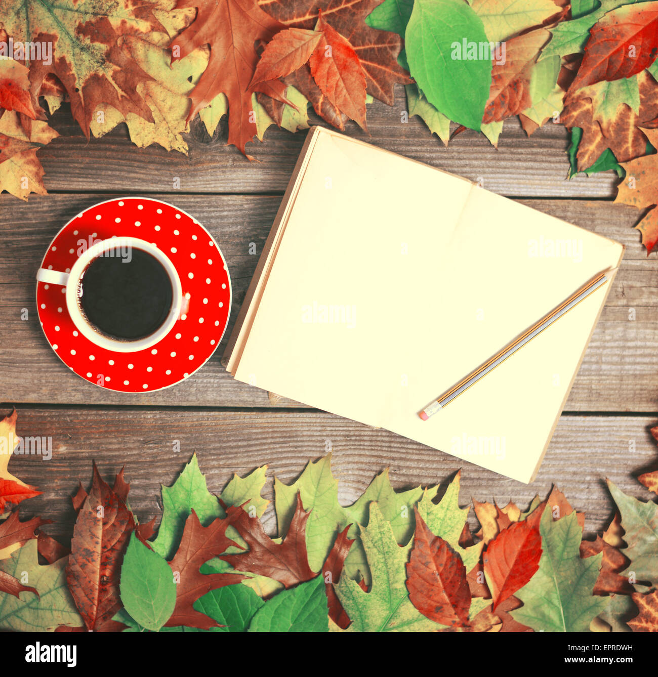 Colorful autumn background with autumnal leaves book and coffee cup ...