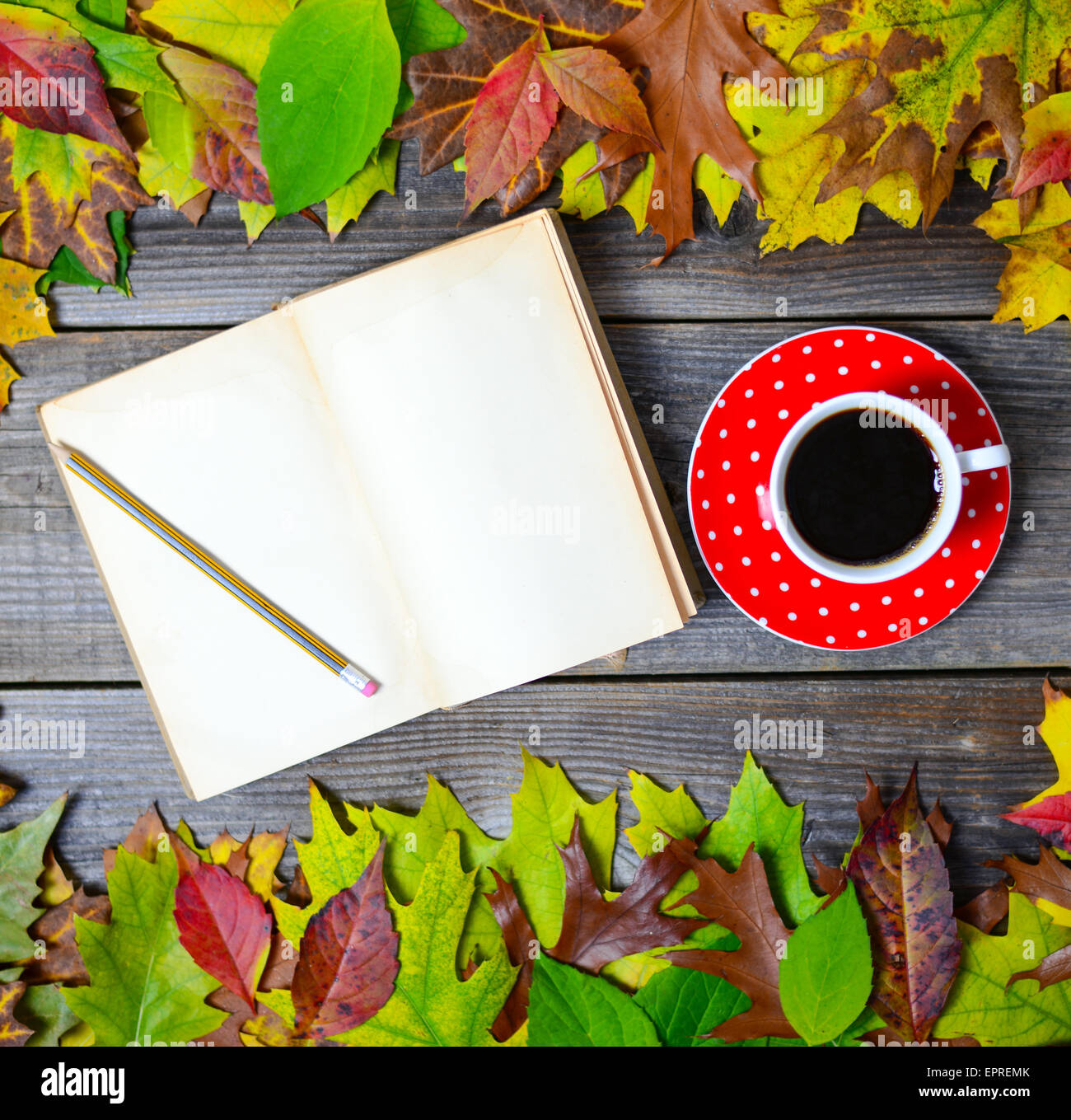 Colorful autumn background with autumnal leaves book and coffee cup ...