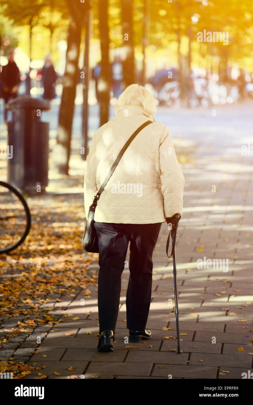 Walking aid stick old age lady woman elderly hi-res stock photography ...