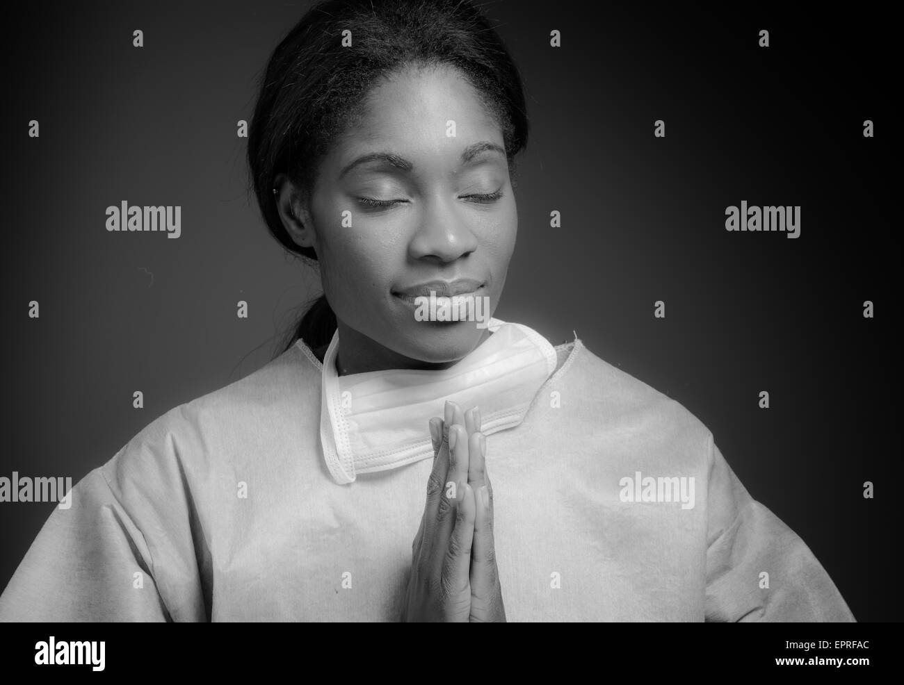 Model isolated praying Stock Photo - Alamy