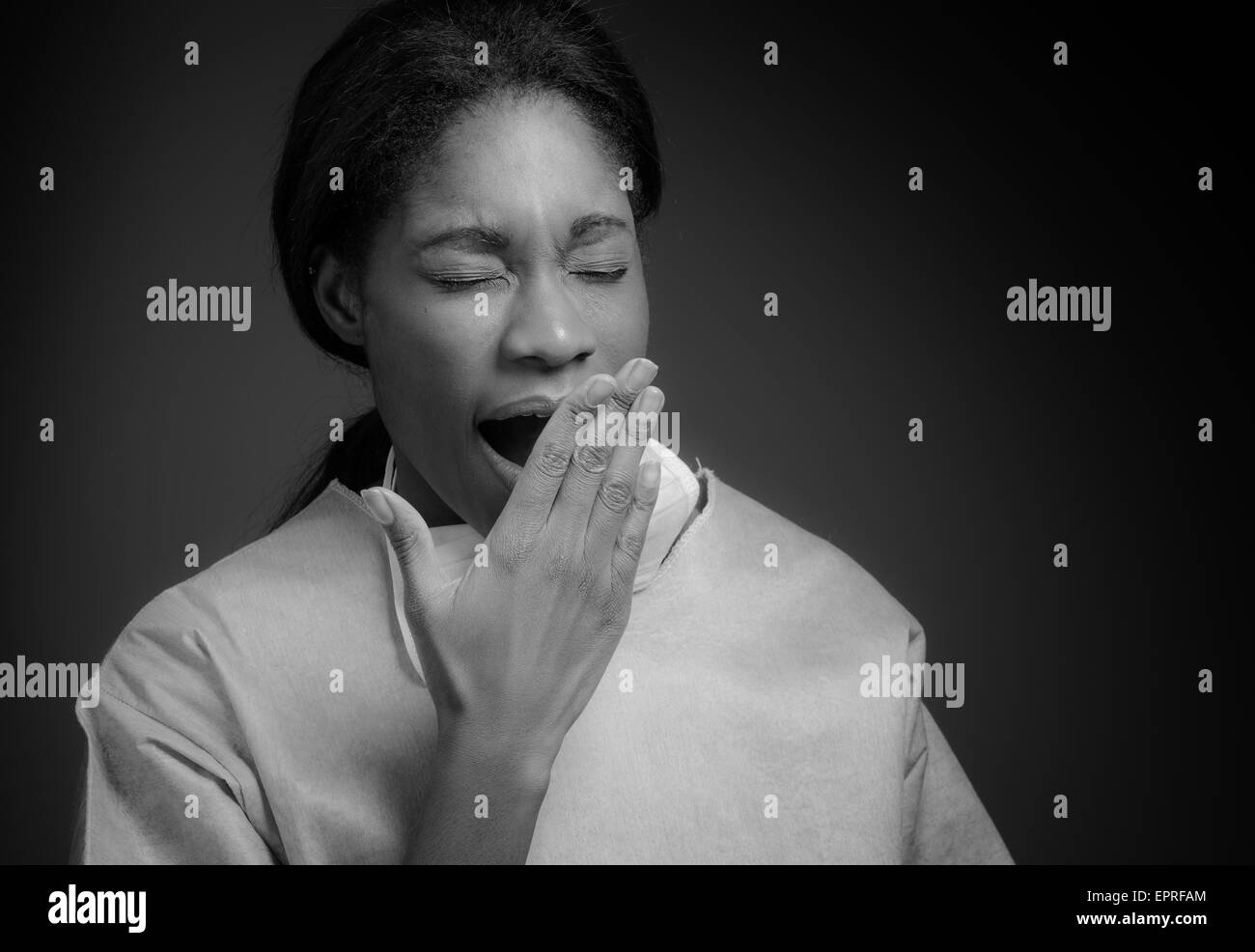 Model tired yawning Stock Photo - Alamy