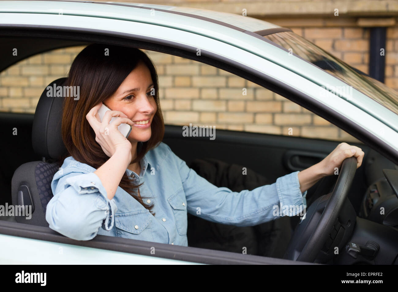 Talking while driving hi-res stock photography and images - Alamy