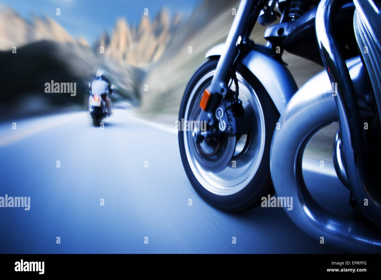 Two motorcycles weave through windy mountain roads Stock Photo - Alamy