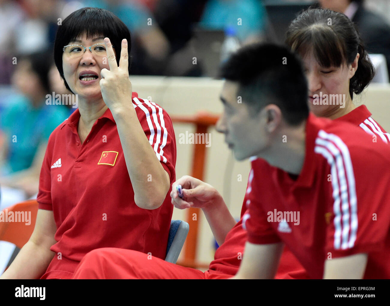 Tianjin, China. 21st May, 2015. Lang Ping (L), coach of China, gestures ...