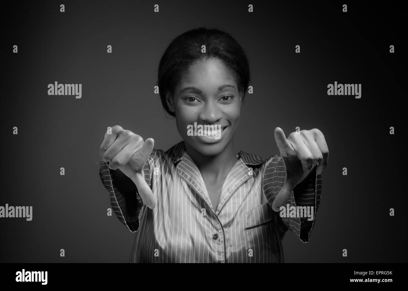 Model pointing to camera Stock Photo - Alamy