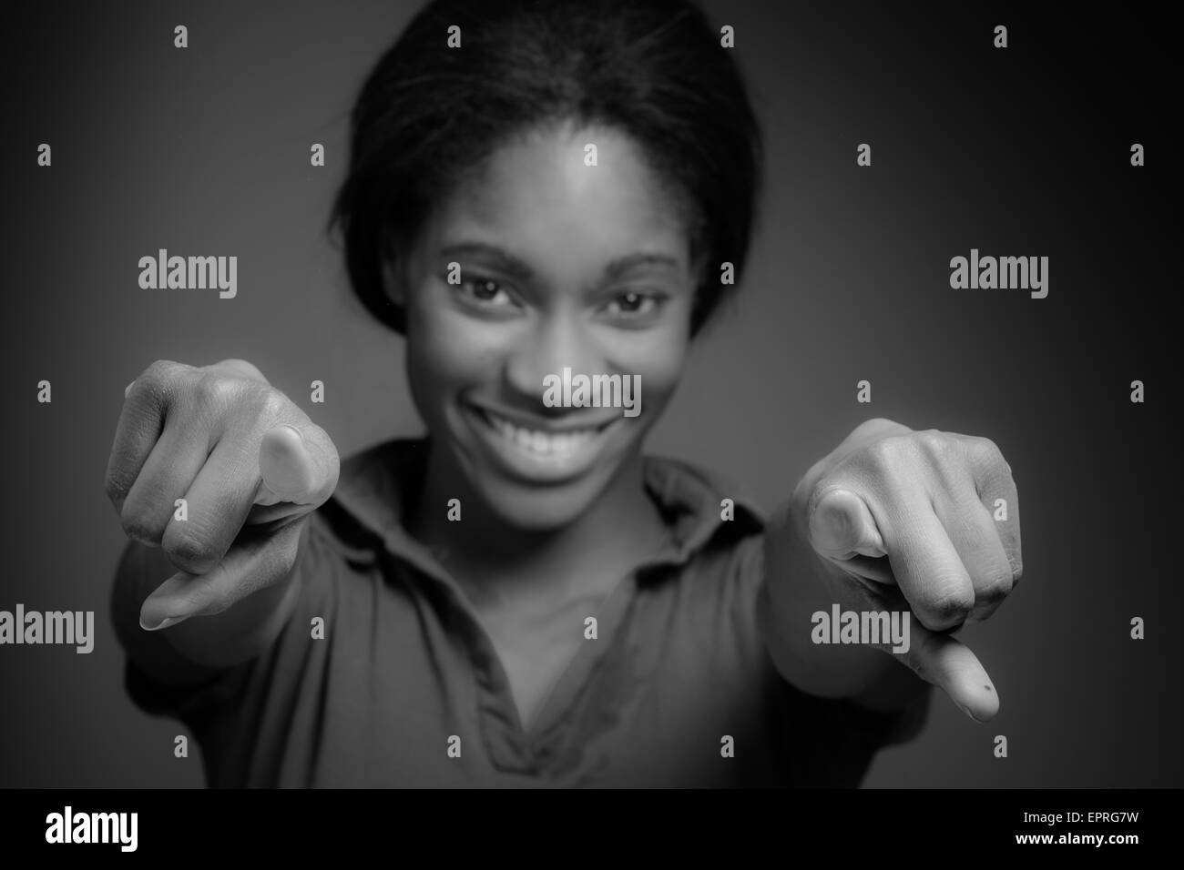 Model pointing to camera Stock Photo - Alamy