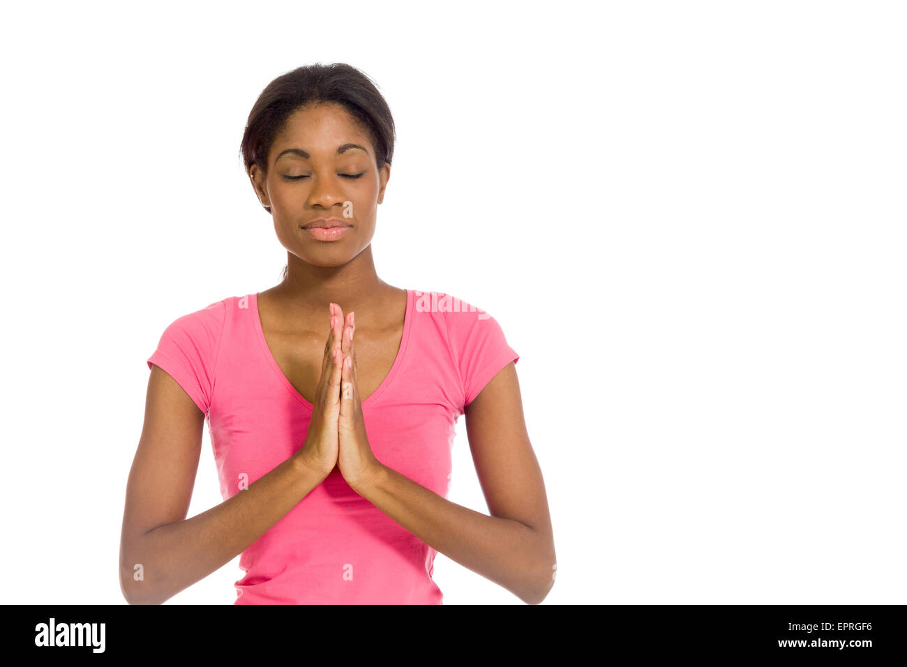 Model isolated on plain background in studio wishing praying Stock ...