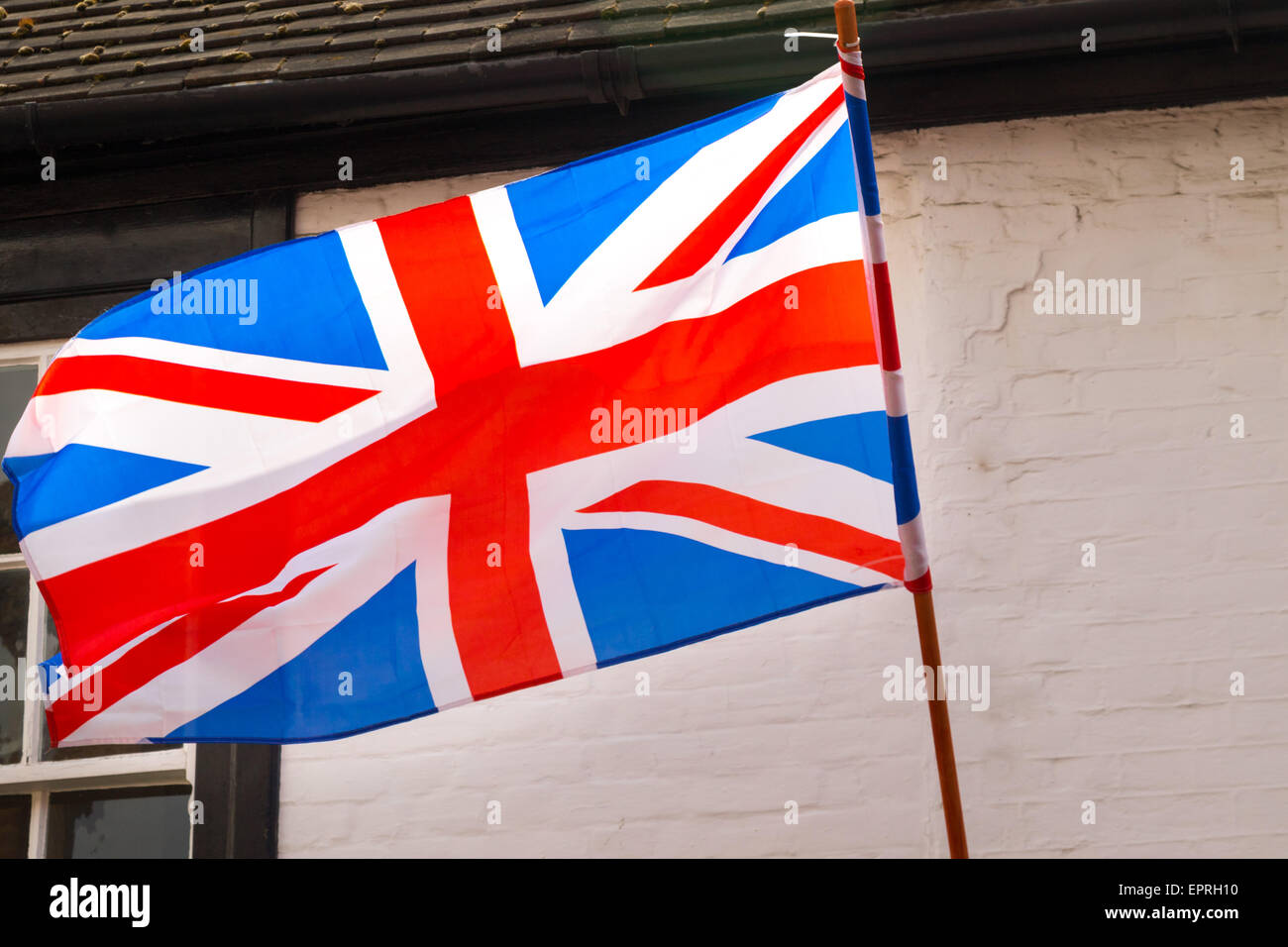 Union Flag outside a building. United Kingdom Stock Photo - Alamy