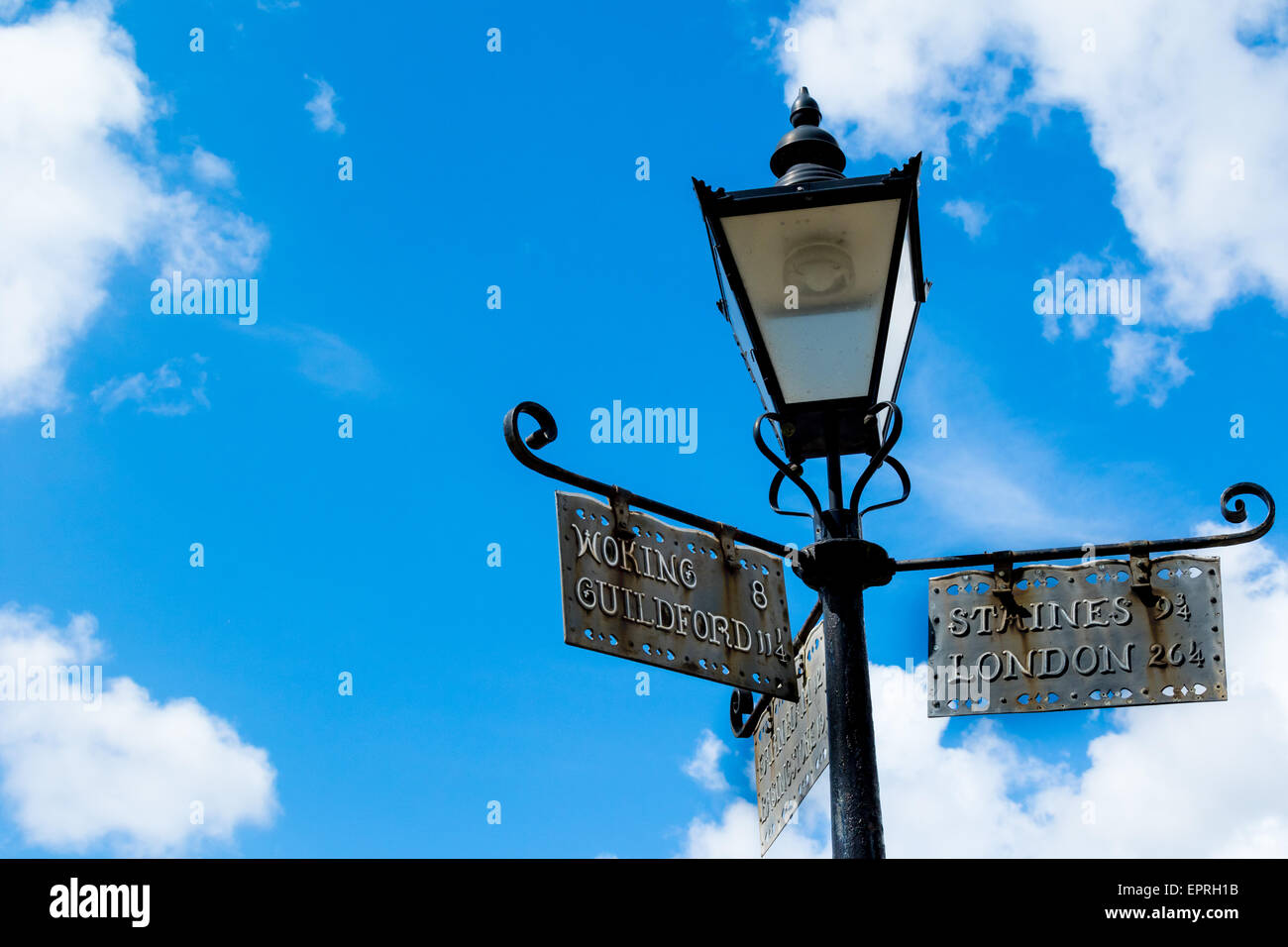Lamp post direction sign signs hi-res stock photography and images - Alamy