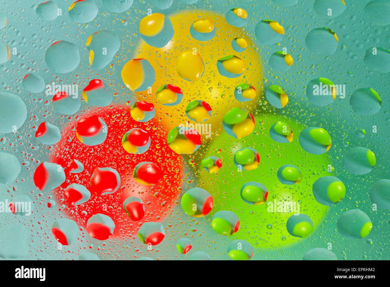 Water drops on a colorful background Stock Photo - Alamy