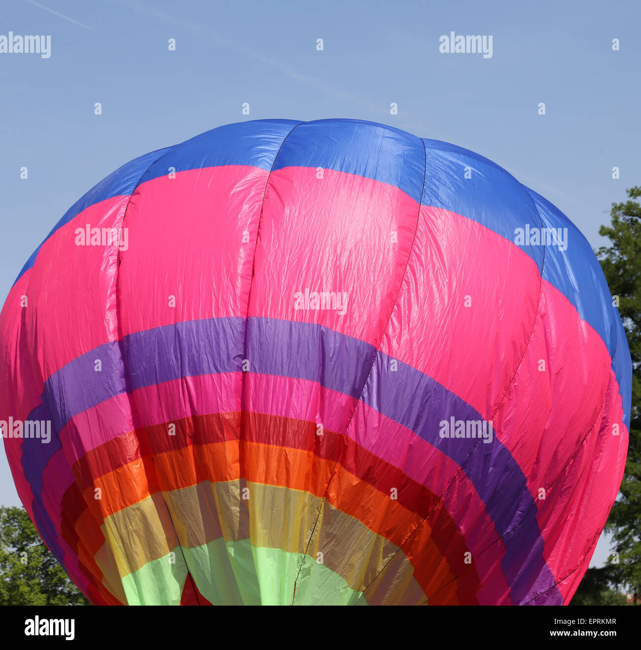 large colorful hot air balloon is flying Stock Photo - Alamy