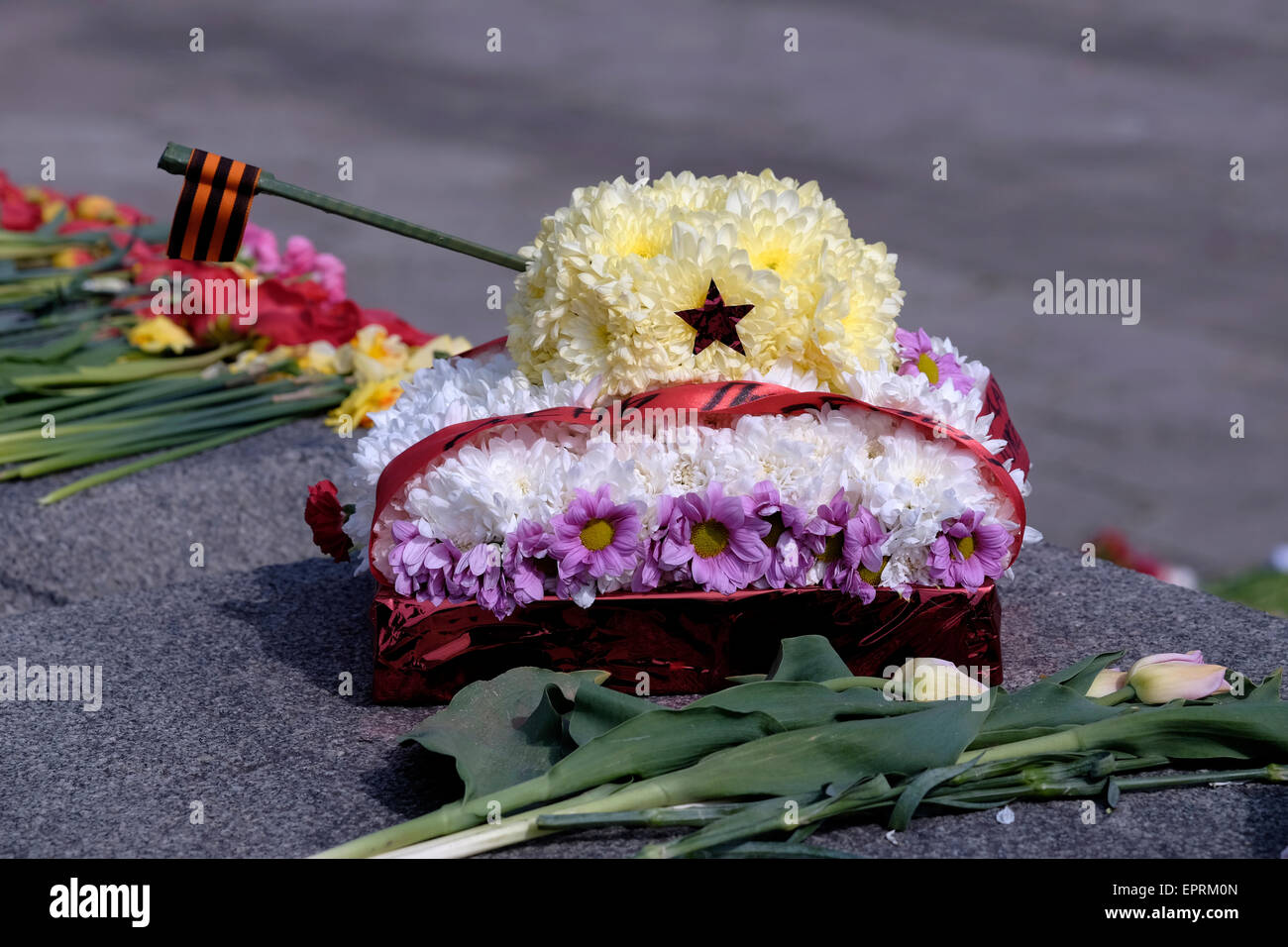 A miniature soviet tank made of flowers placed amid wreaths marking 70 ...