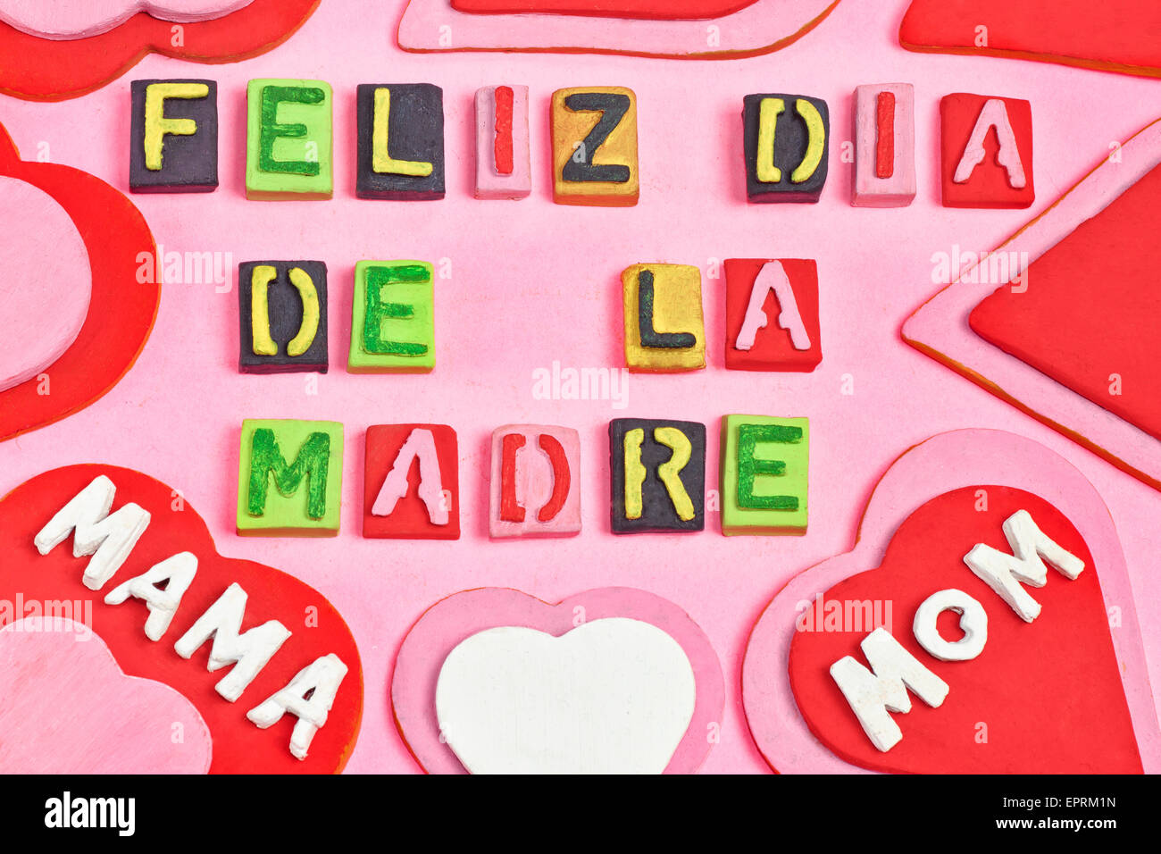 Happy Mother's day words and heart on pink background, words on spanish ...