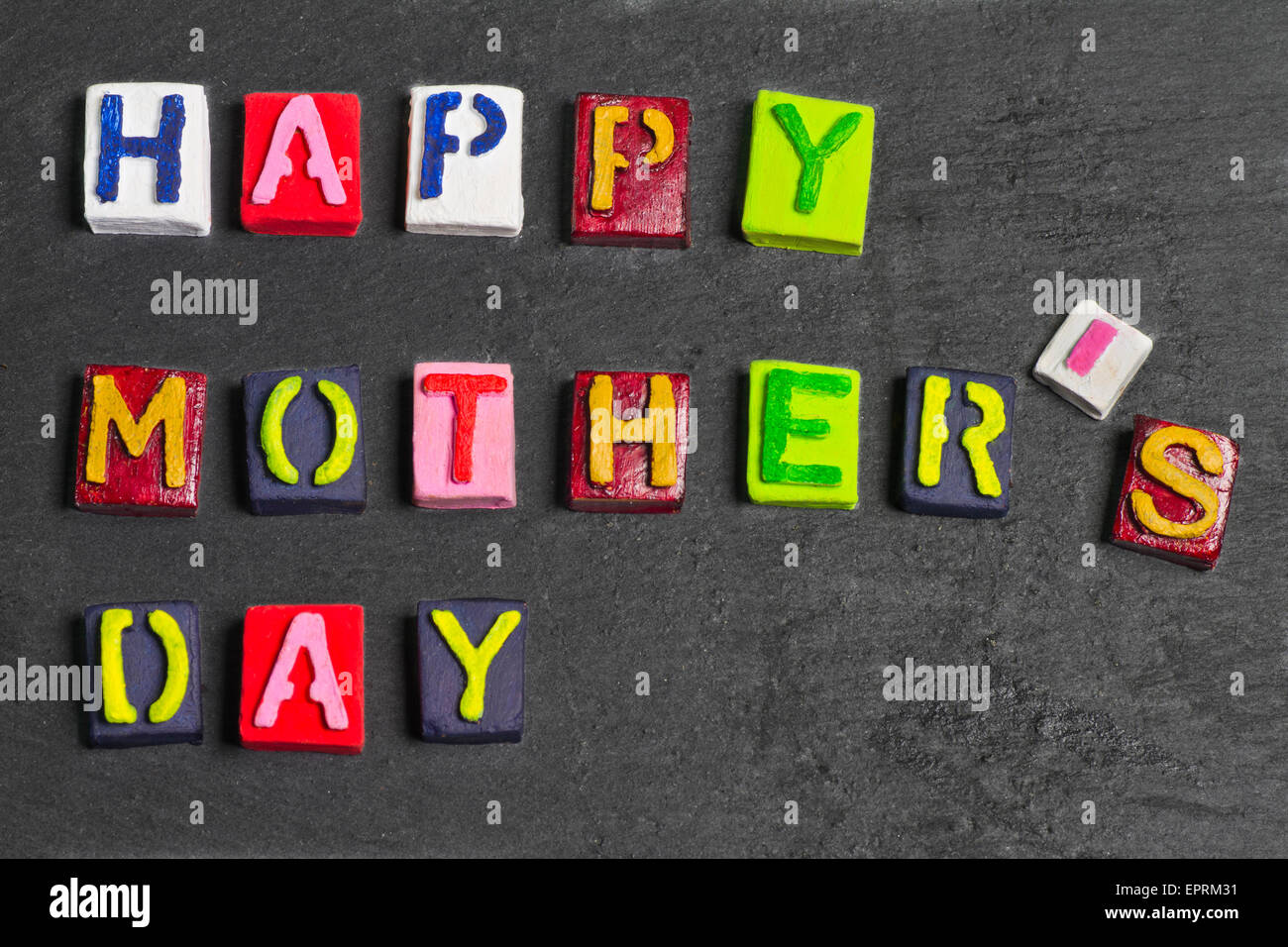 Happy Mother's day words on dark stone background Stock Photo - Alamy