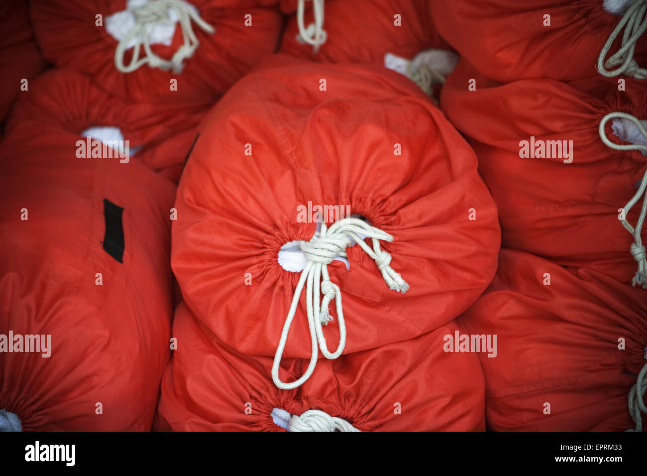Brightly colored laundry bags. Tokyo, Japan Stock Photo - Alamy