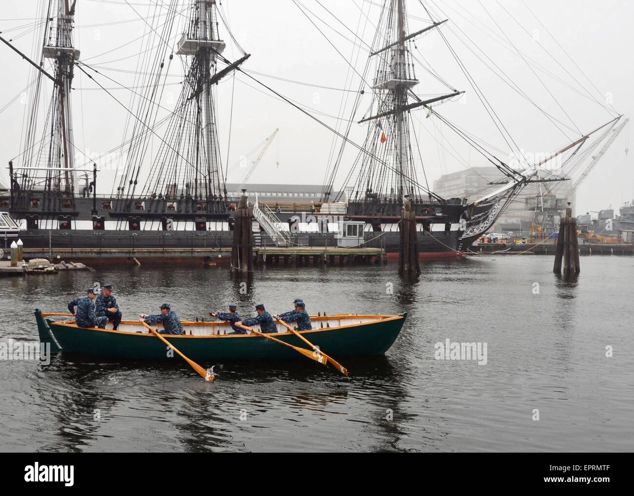 U.S. Navy Sailors assigned to the USS Constitution practice rowing the ...