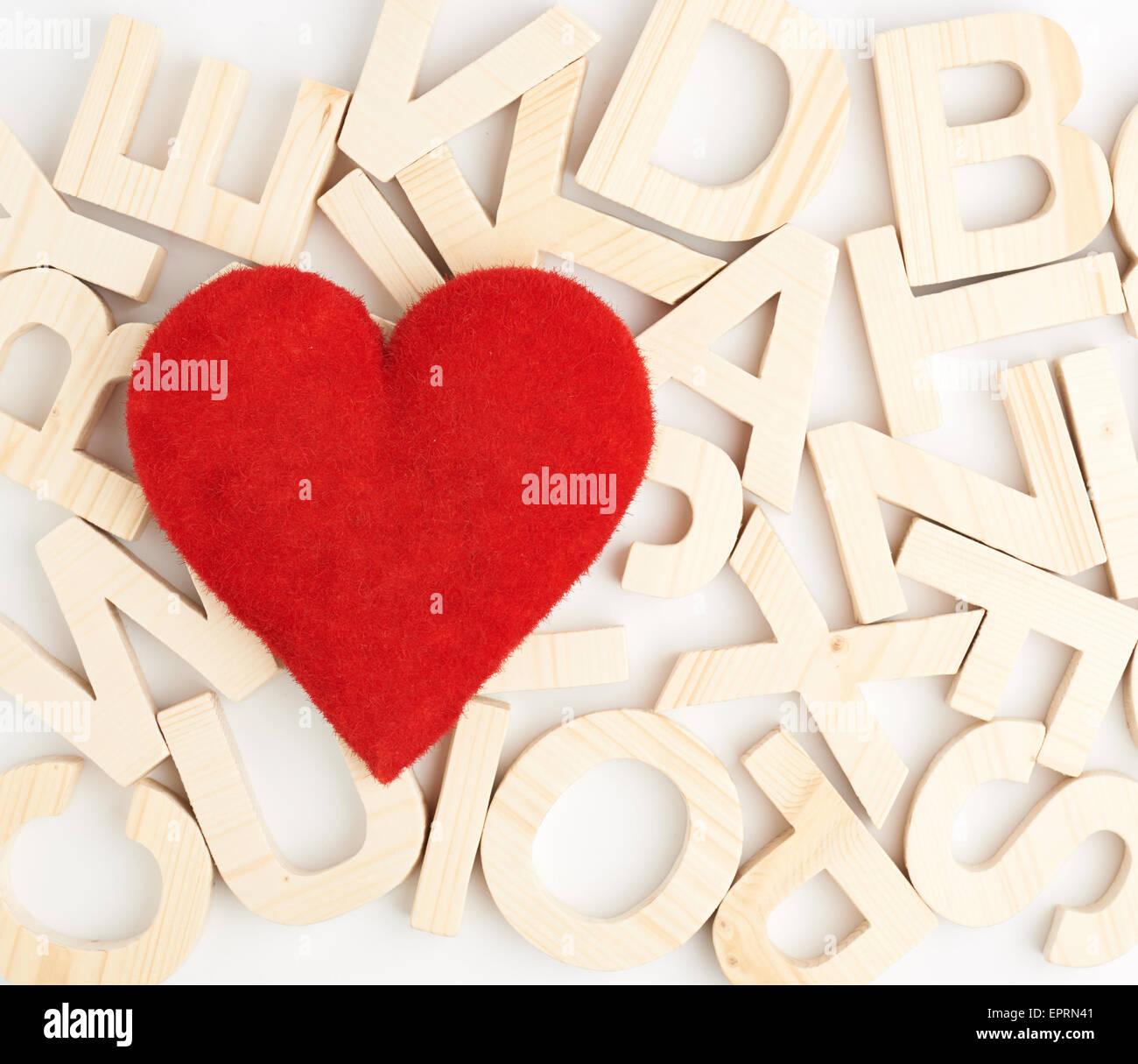 Heart over the wooden letters Stock Photo - Alamy