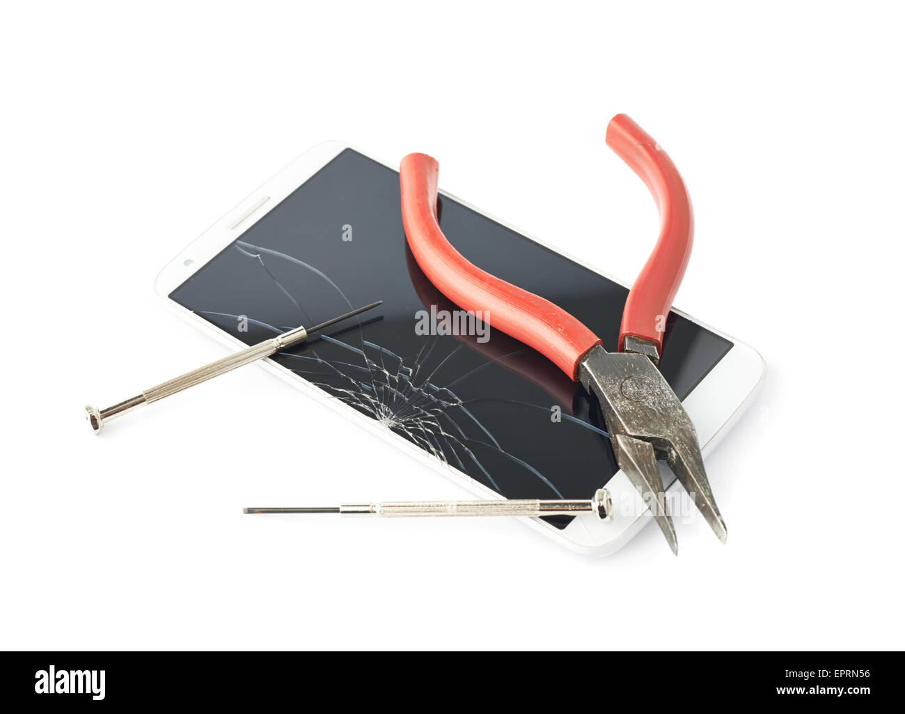 Pliers and screwdriver over the broken phone Stock Photo - Alamy