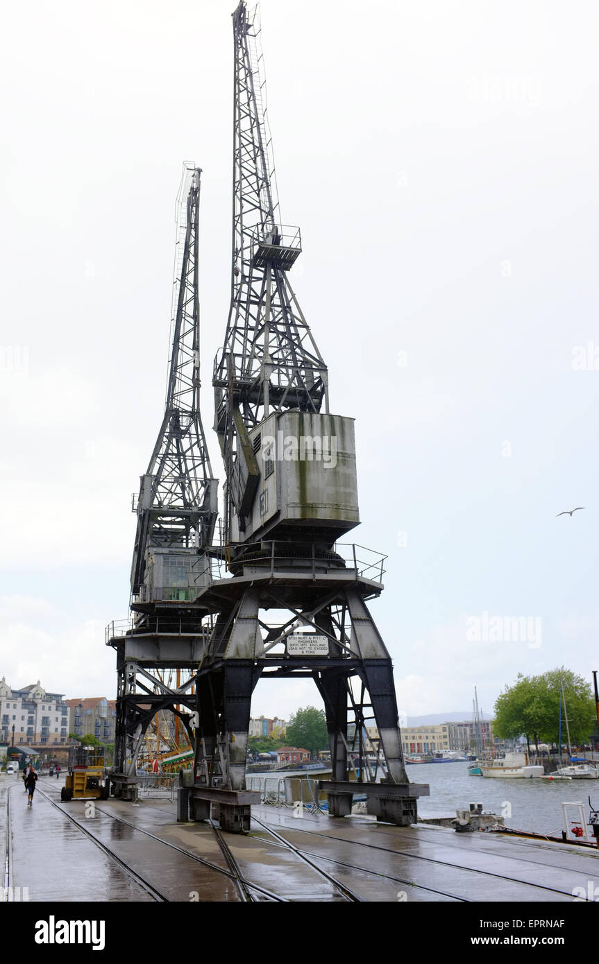 Preserved steam cranes on the edge of Bristol Harbour in front of the M ...