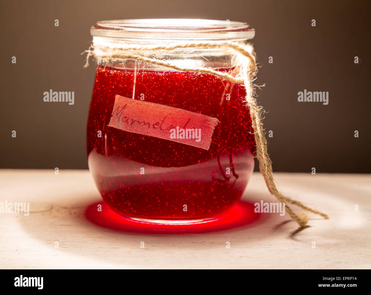 Jam in a jar with cord Stock Photo - Alamy