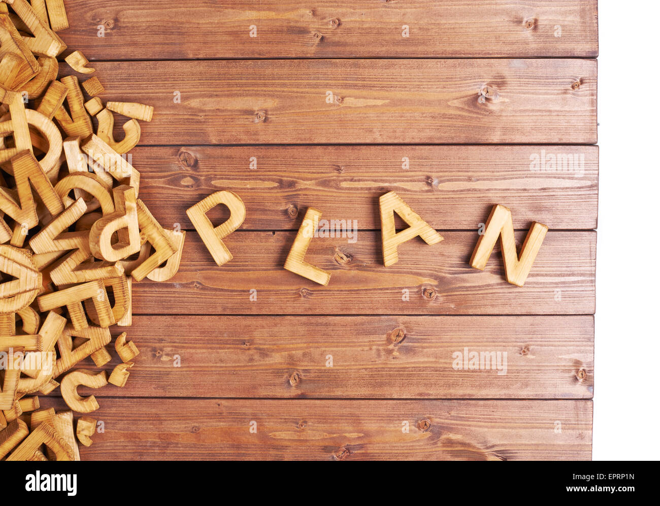 Word plan made with wooden letters Stock Photo - Alamy