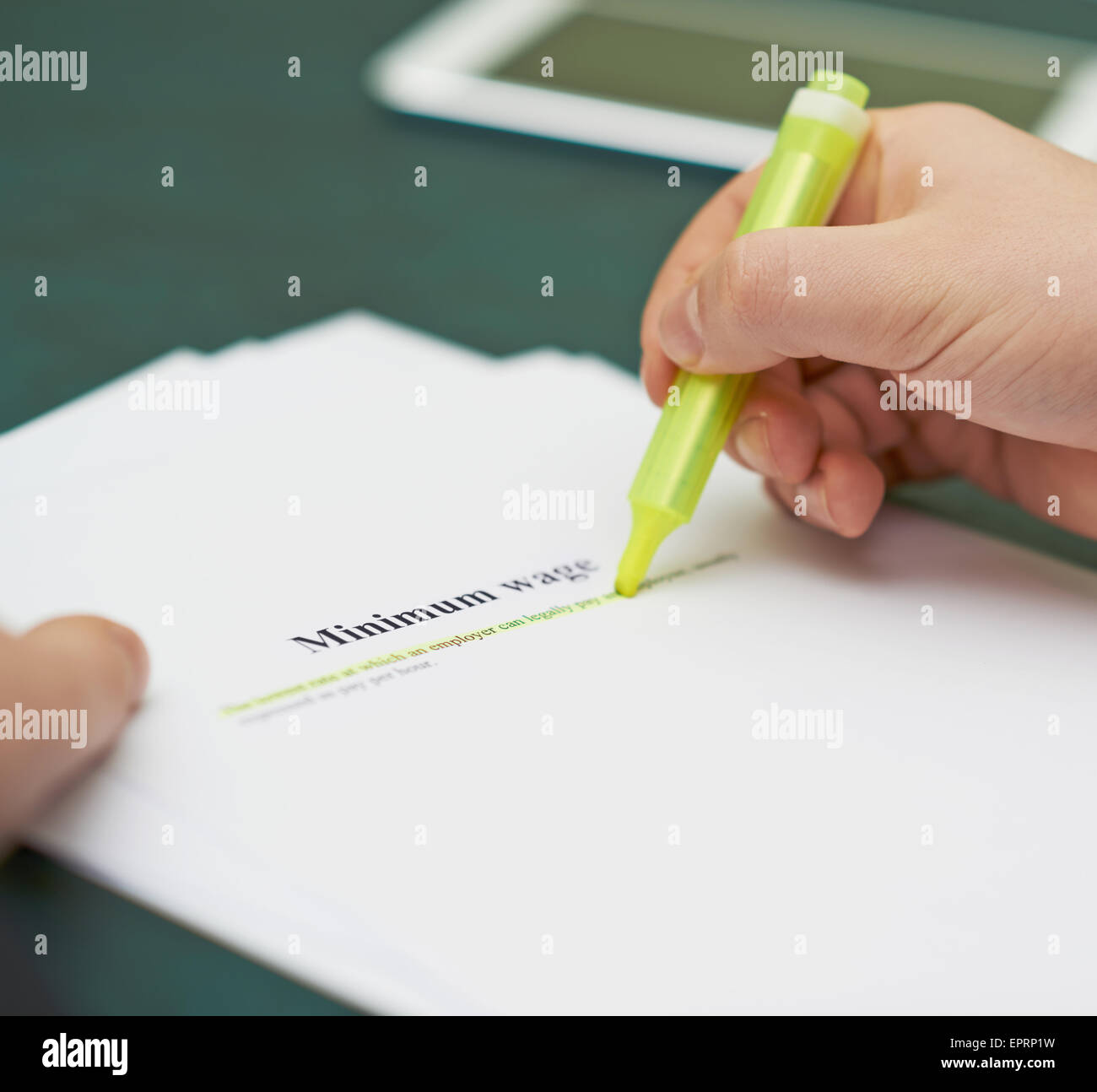 Marking words in a minimum wage definition Stock Photo - Alamy