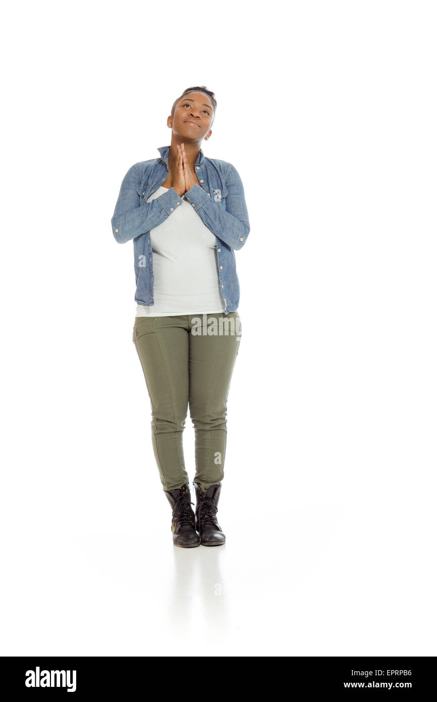 Model isolated on plain background in studio wishing praying Stock ...