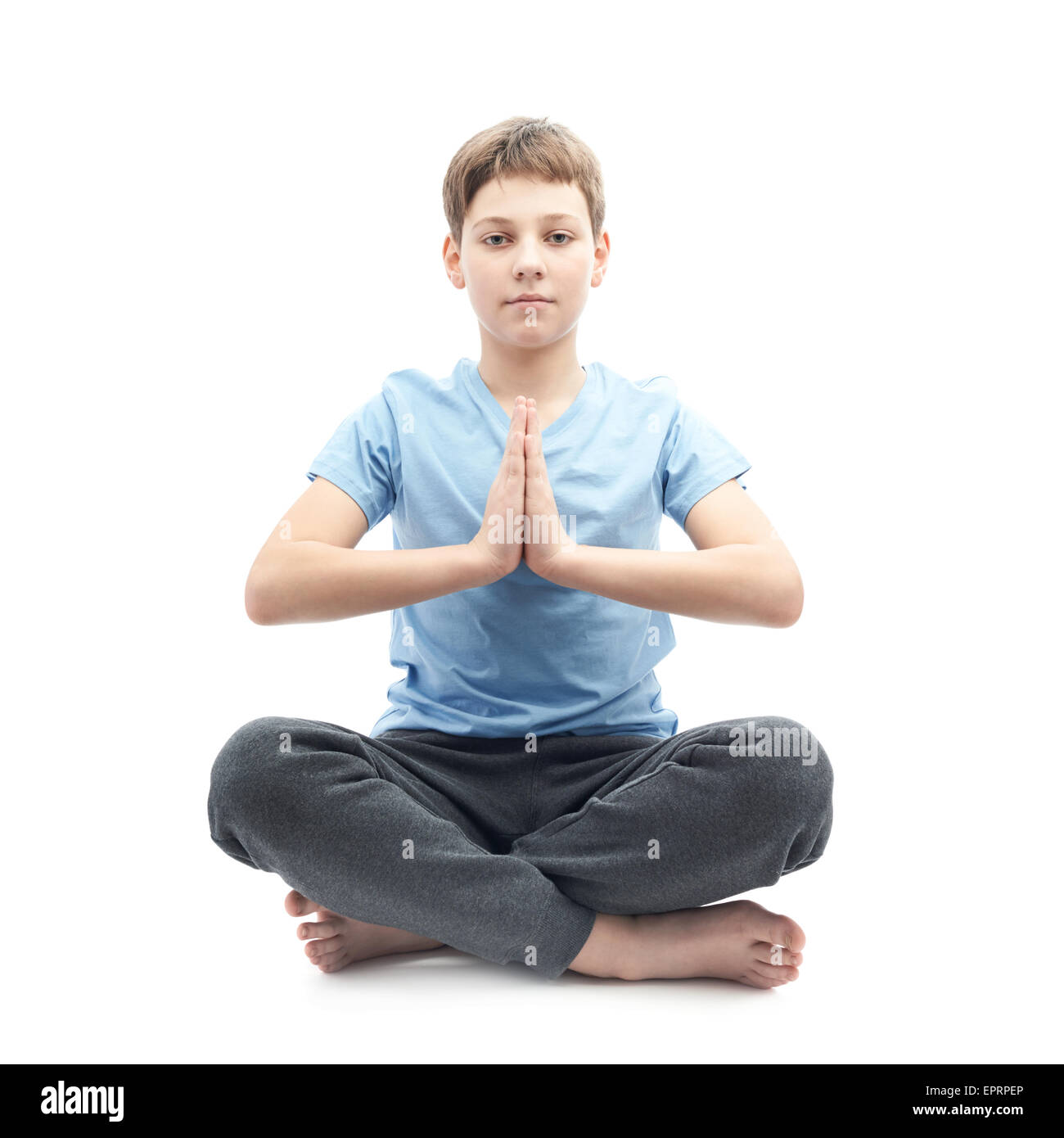 Young boy doing yoga Stock Photo - Alamy
