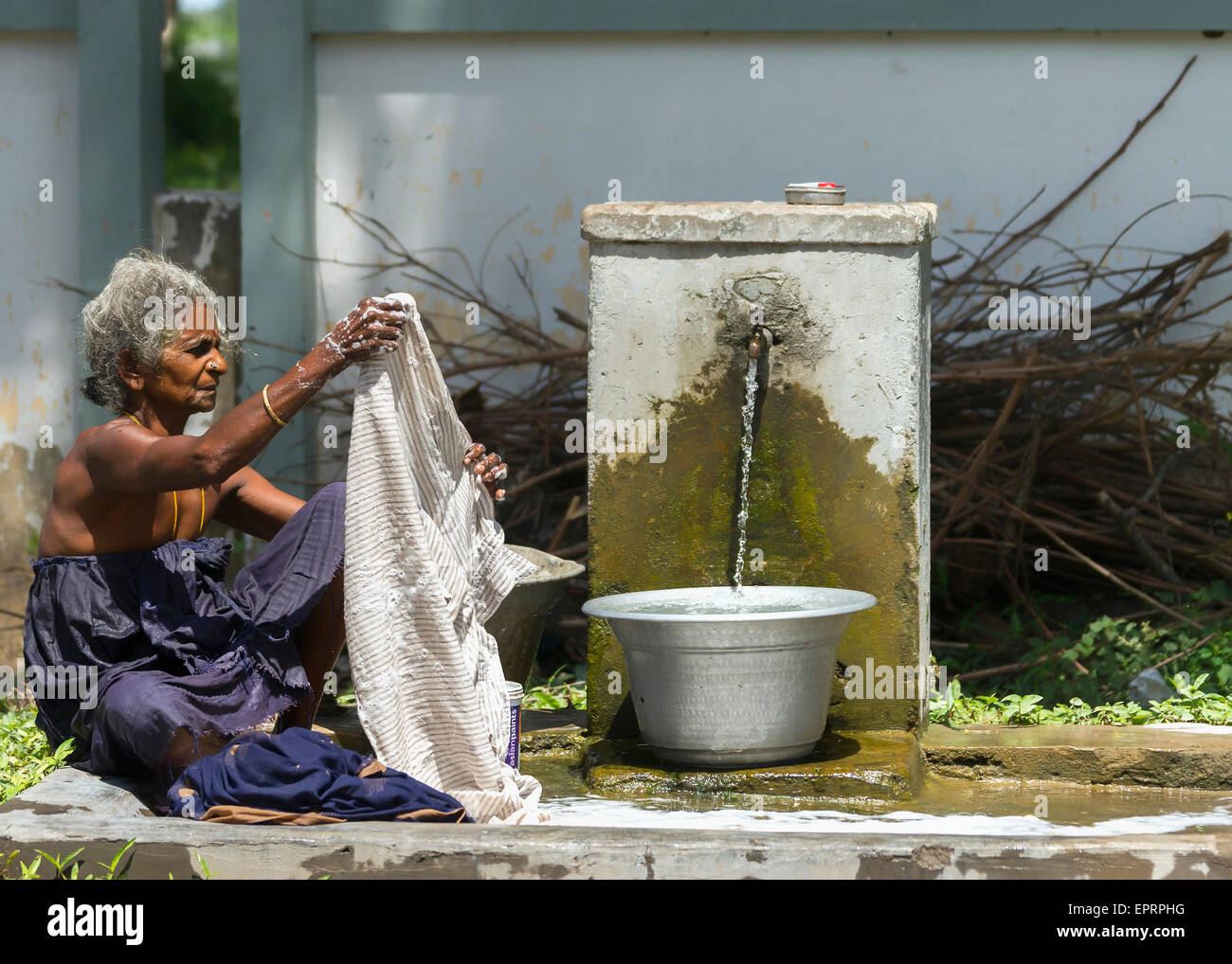 Communal water pump hi-res stock photography and images - Alamy