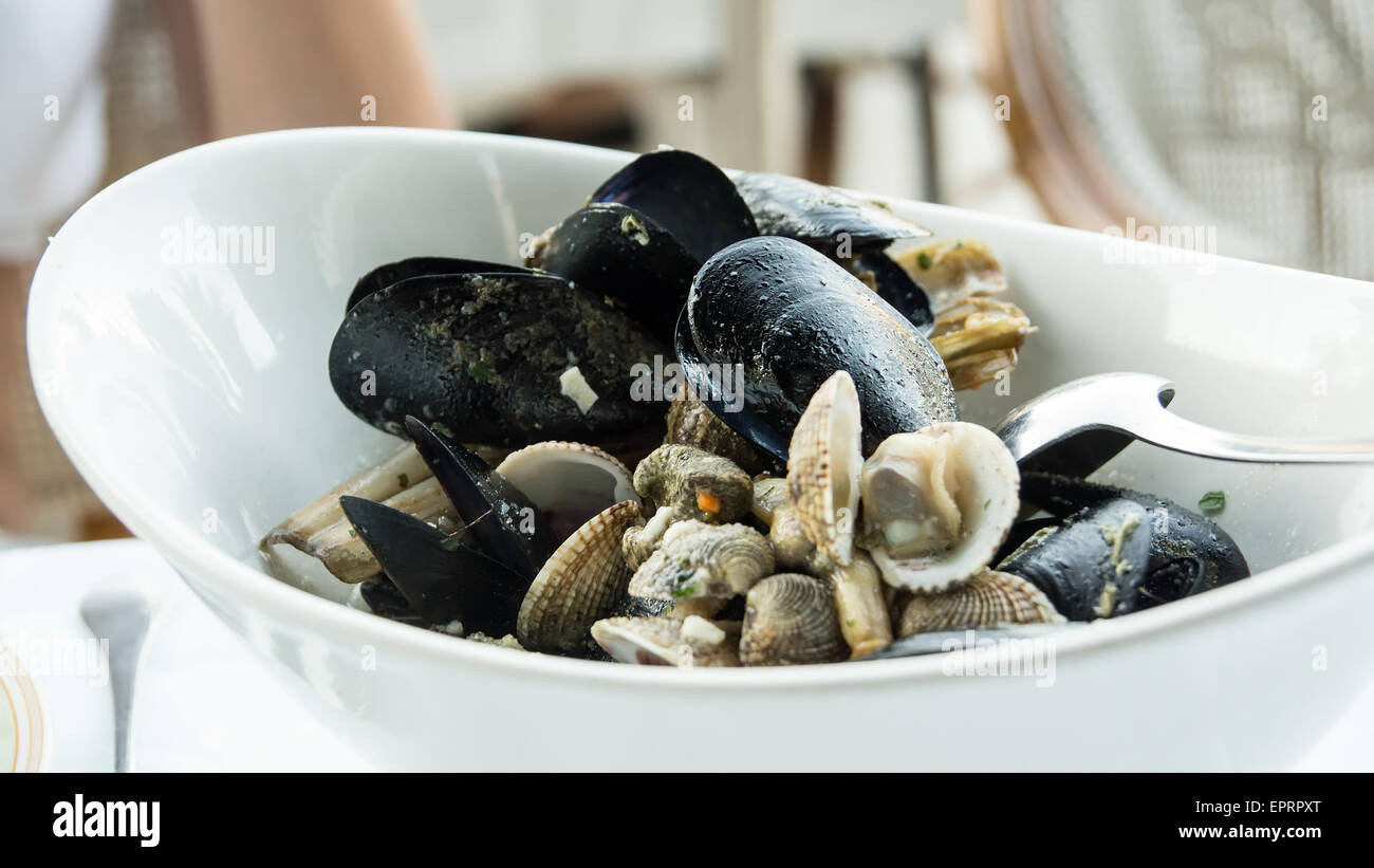 Dish of tasty mixed mediterranean shellfish, mussels Stock Photo - Alamy