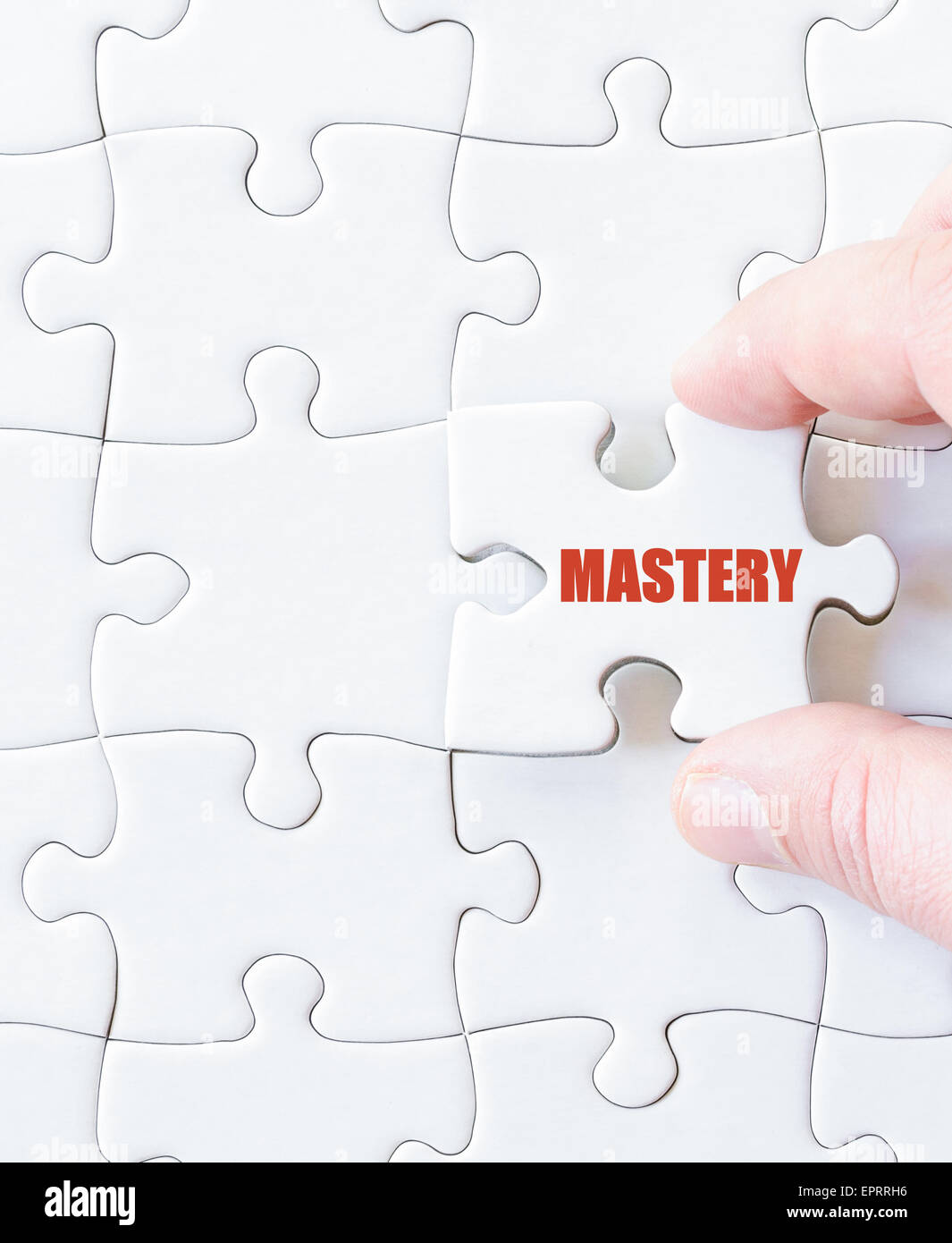 Last puzzle piece with word MASTERY. Concept image Stock Photo - Alamy