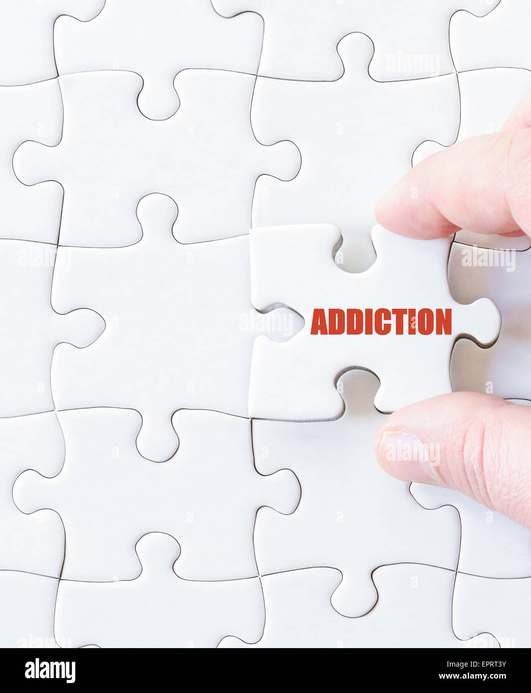 Last puzzle piece with word ADDICTION. Concept image Stock Photo - Alamy