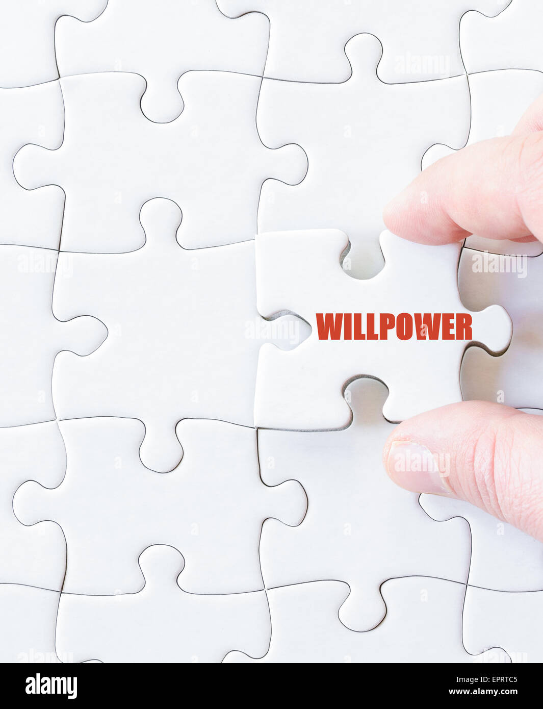 Last puzzle piece with word WILLPOWER. Concept image Stock Photo - Alamy