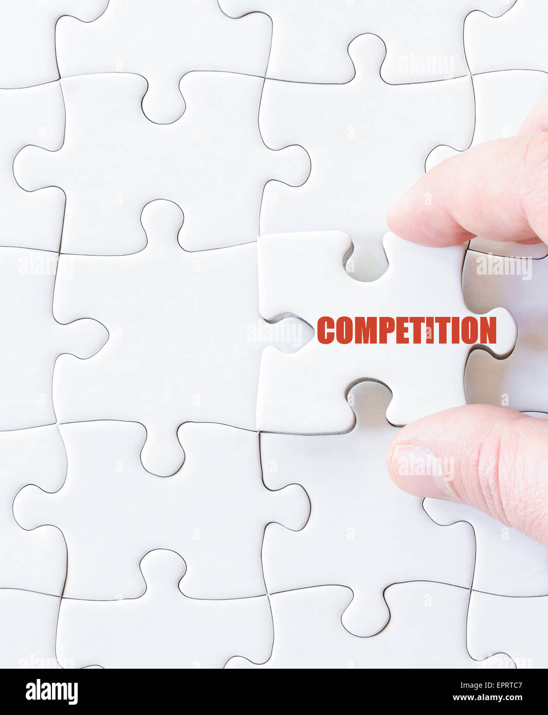 Last puzzle piece with word COMPETITION. Concept image Stock Photo - Alamy